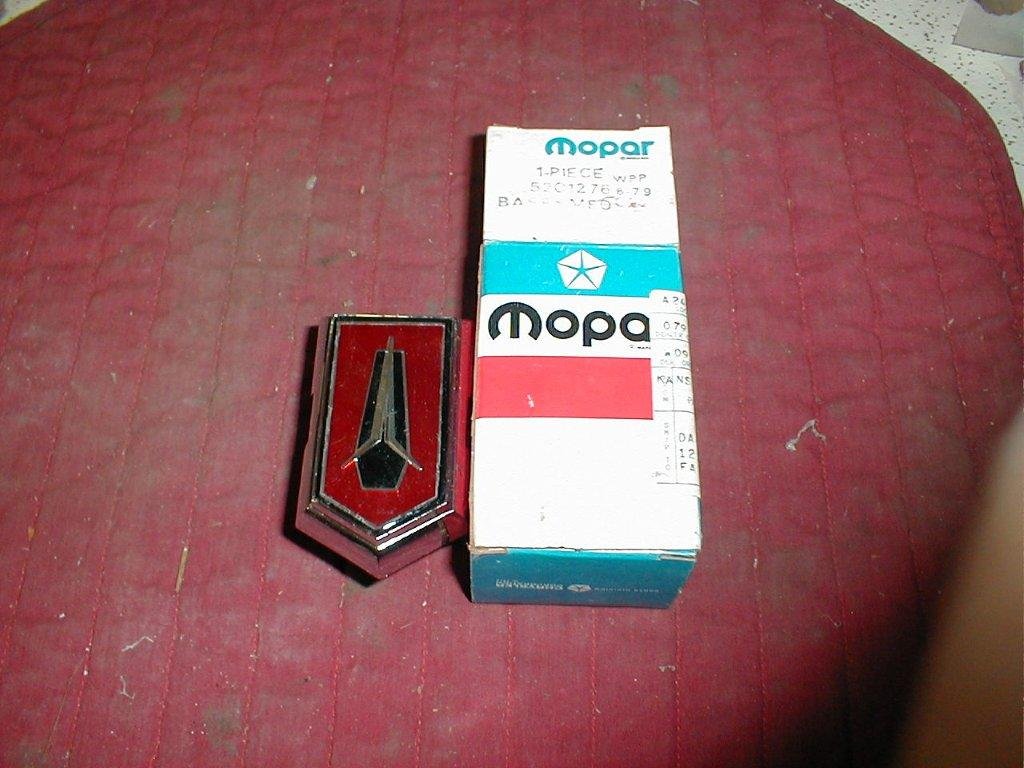NOS Mopar Grille Medallion 1979-80 Plymouth Horizon - Hiltop Auto Parts